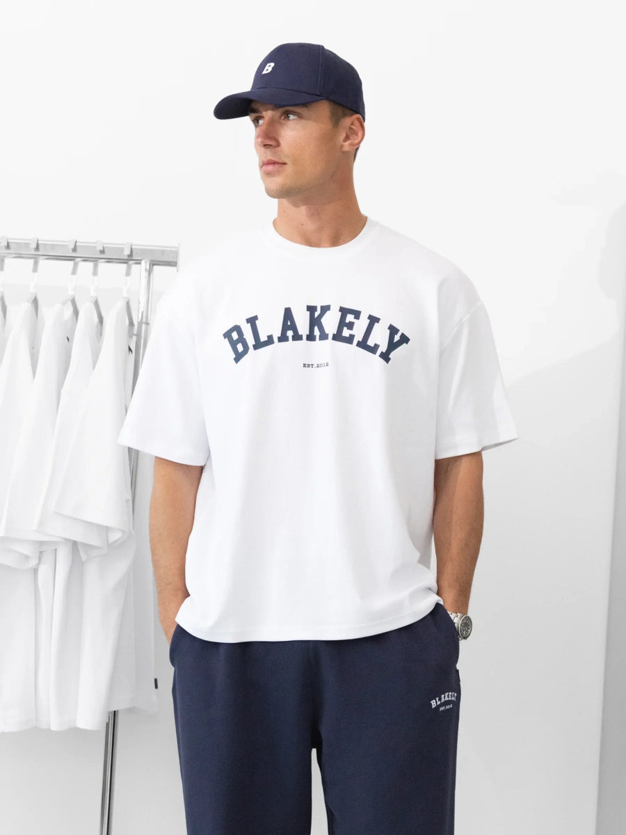 Buy Blakely Mens White & True Navy Varsity Unfitted T-Shirt | Free ...